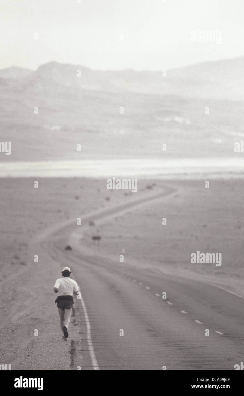 Man running in desert California USA Stock Photo - Alamy