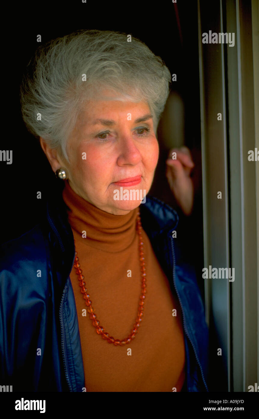 Woman age 70 looking thoughtfully from the doorway. Western Springs ...