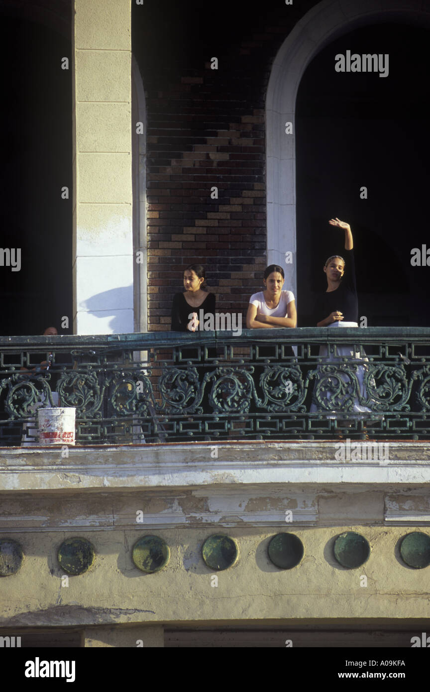 Cuba Havana Dance school along the Malecon girls waving Stock Photo - Alamy