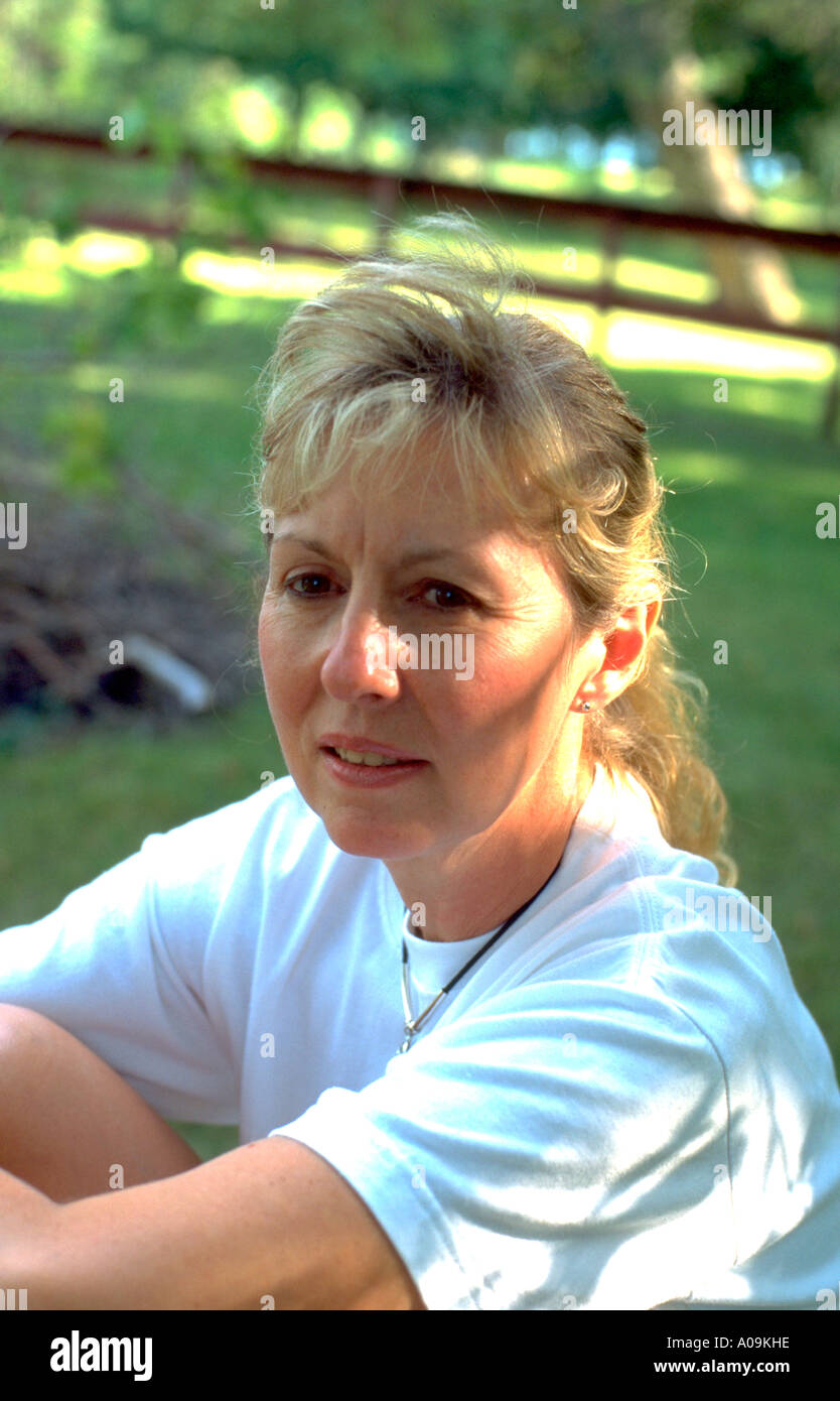 Reflective pose middle woman hi-res stock photography and images - Alamy