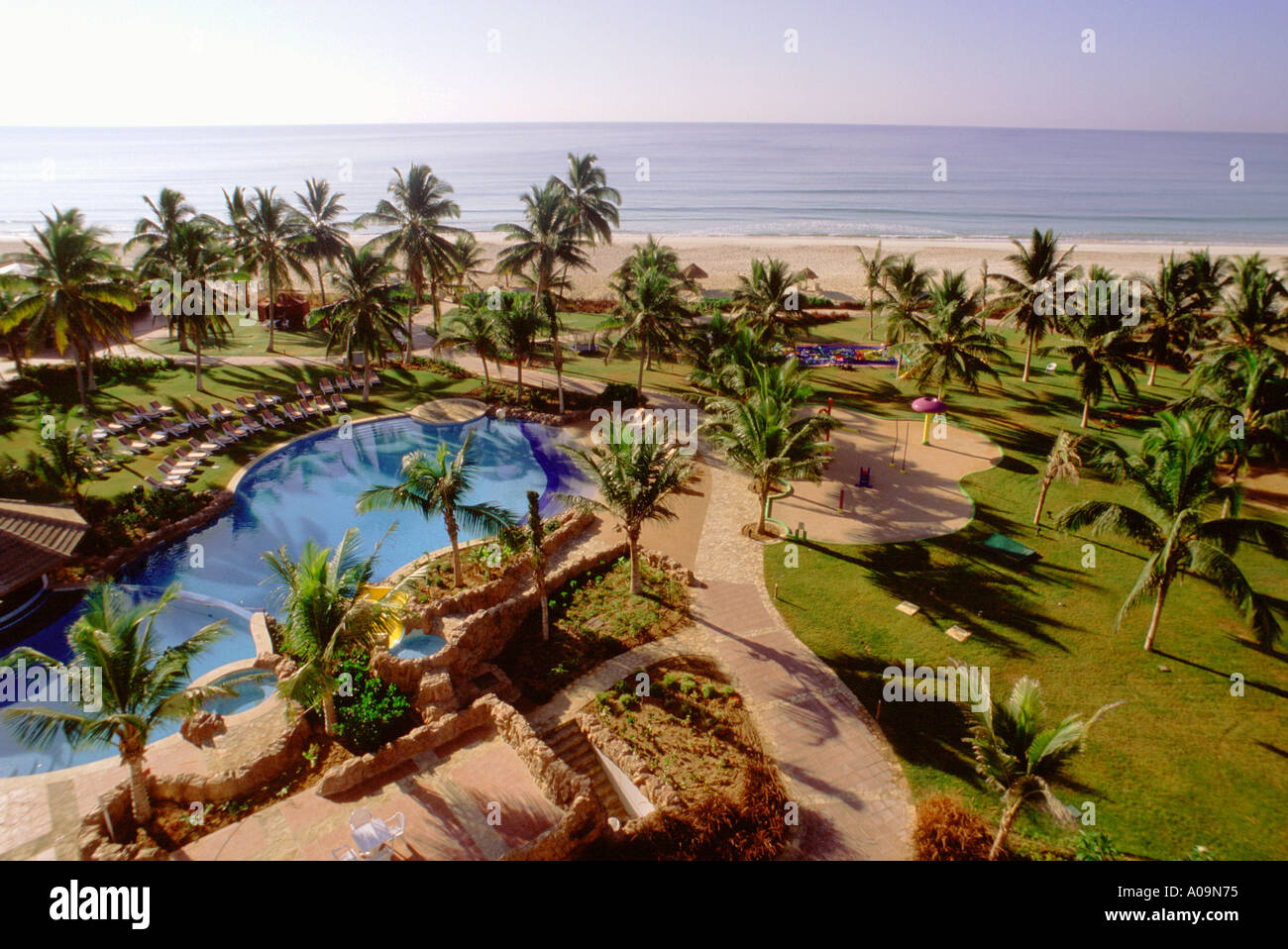 Oman, Salalah. Swimming pool, grounds & Beach of Crowne Plaza Hotel ex ...