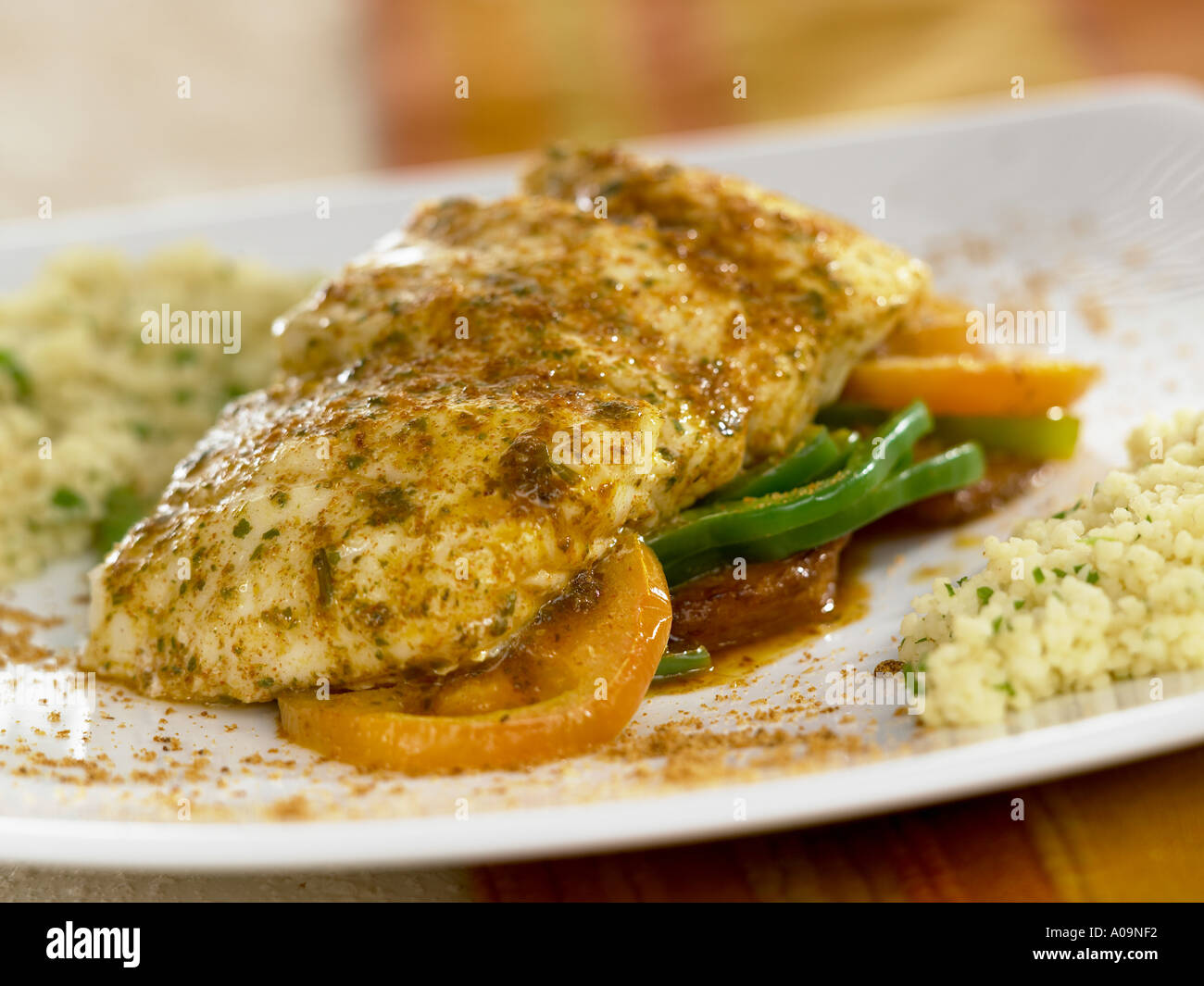 coated white fish dish Stock Photo - Alamy