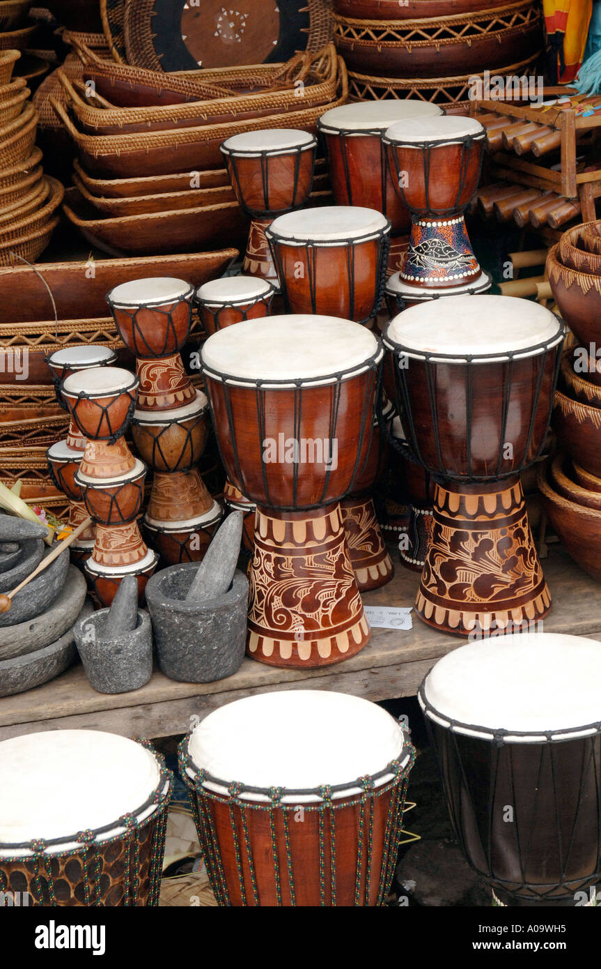 Polished wooden drums and baskets, street market, Bali Indonesia Stock ...