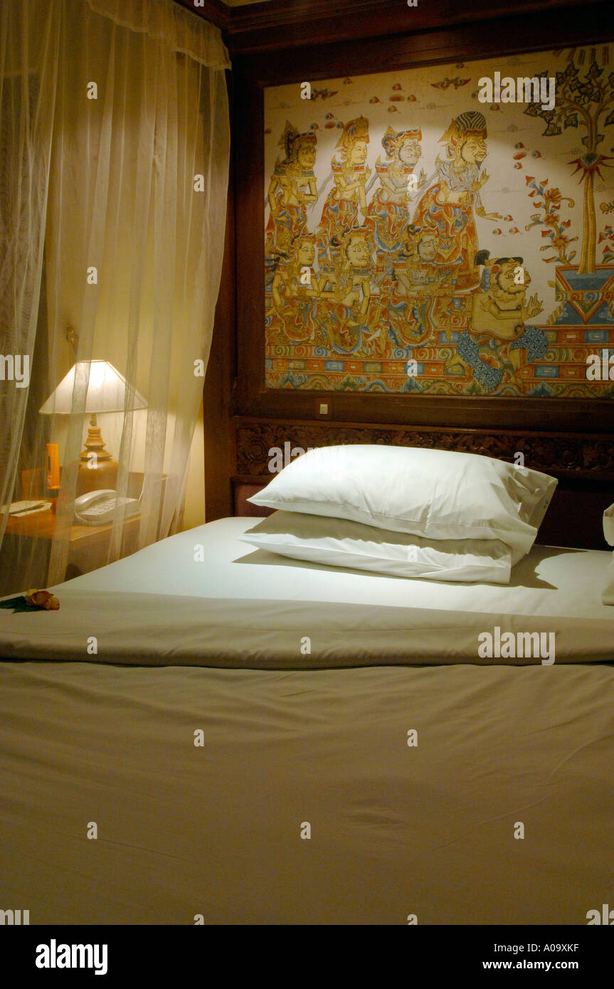 Luxurious four poster bed with mosquito net, Balinese Hotel, Ubud, Bali ...