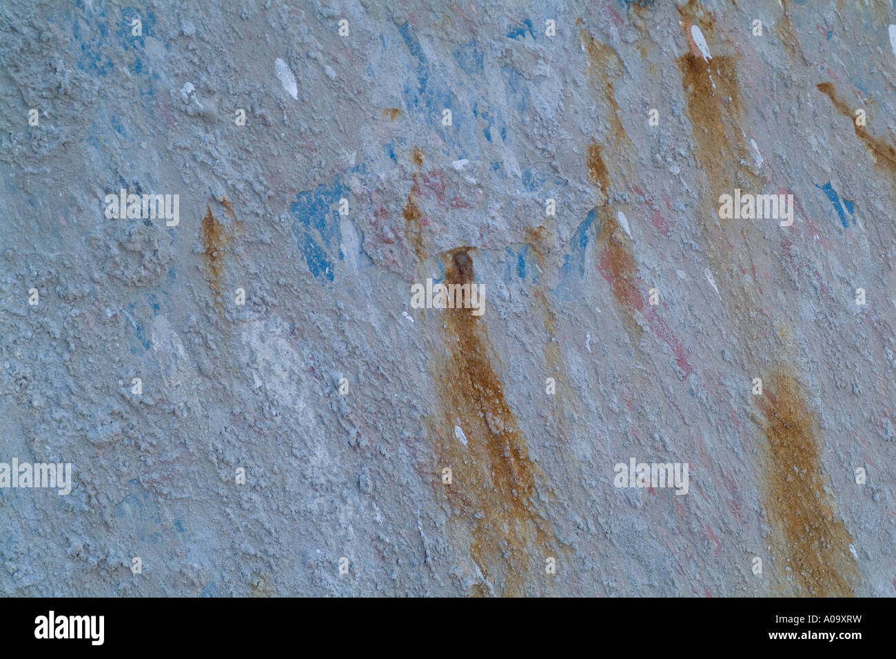 Metal with concrete and rust caked on form an abstract background ...