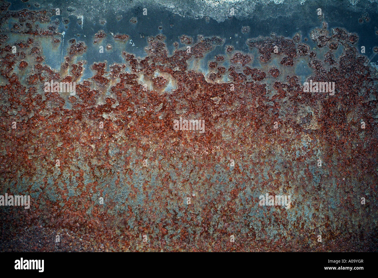 Metal with rust and flaking paint form a background pattern Stock Photo ...
