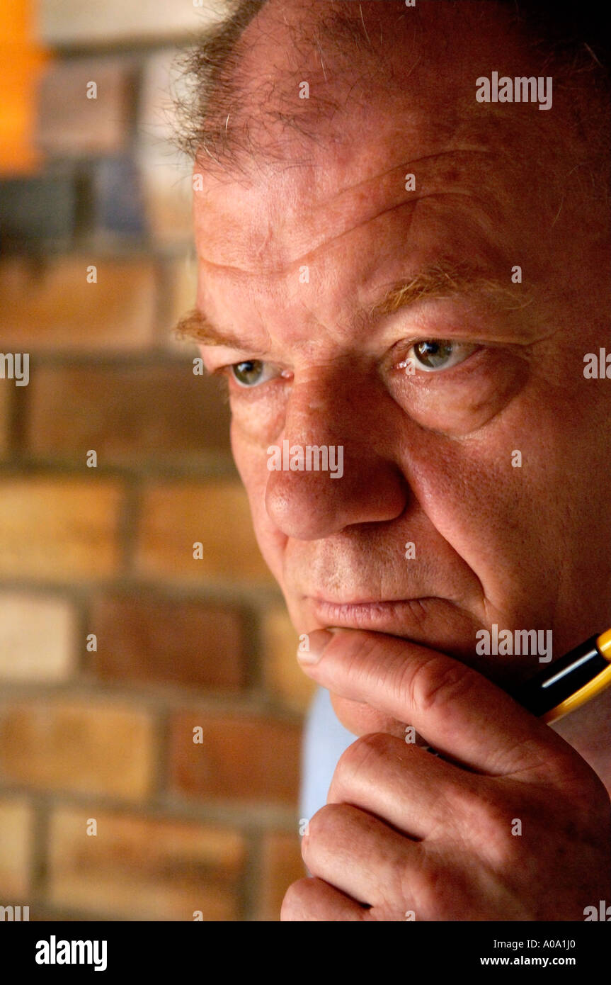 Intense thinking hi-res stock photography and images - Alamy