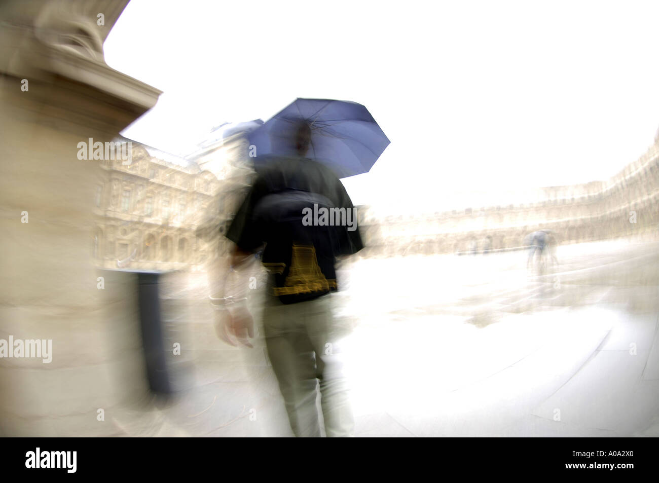 Louvre rain umbrella hi-res stock photography and images - Alamy
