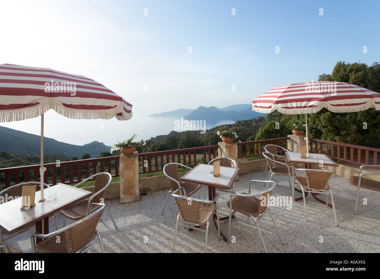 Terrace of Les Roches Rouges Hotel in the late afternoon, Piana, Gulf ...