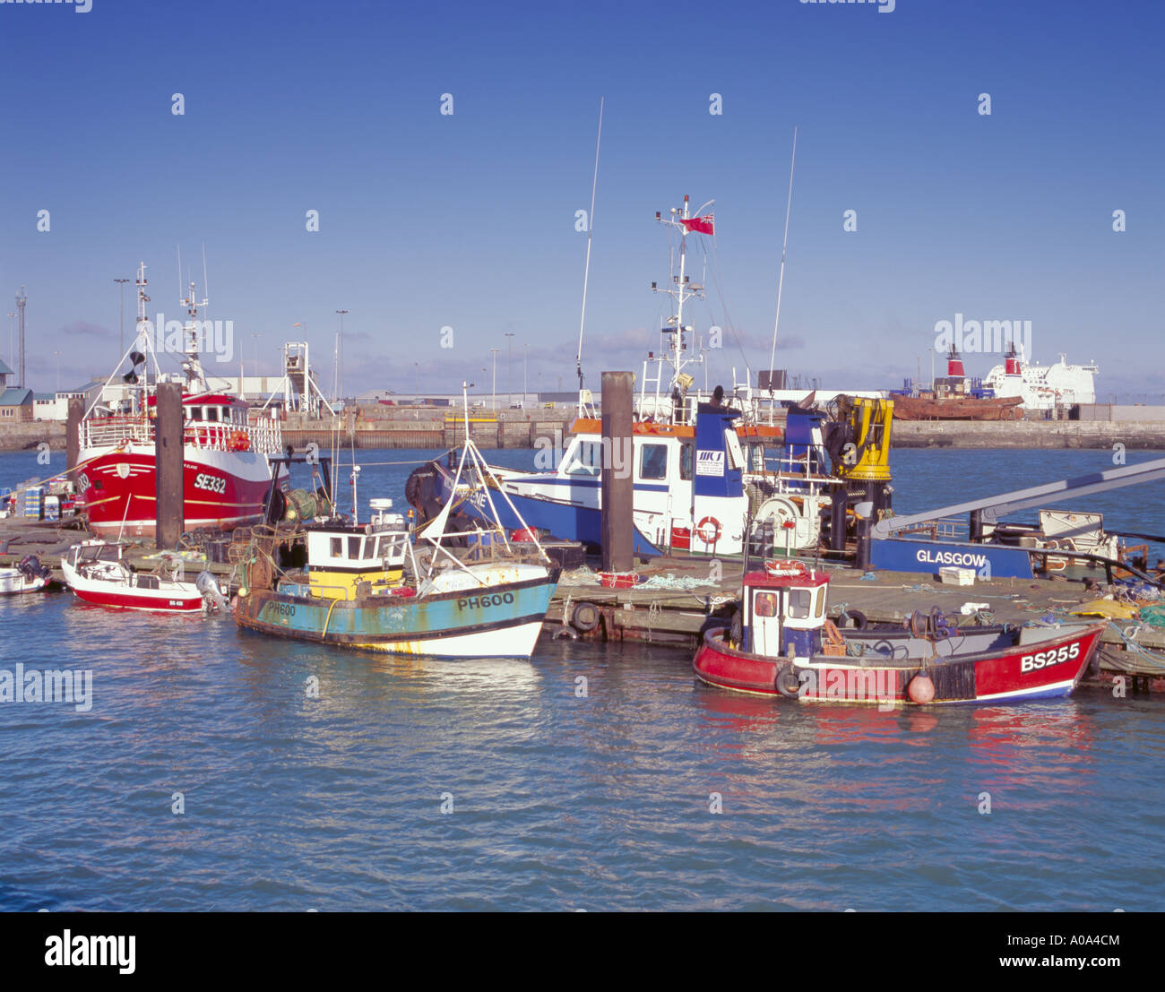Fishing boats in Holyhead Harbour, Anglesey, North Wales, UK Stock ...