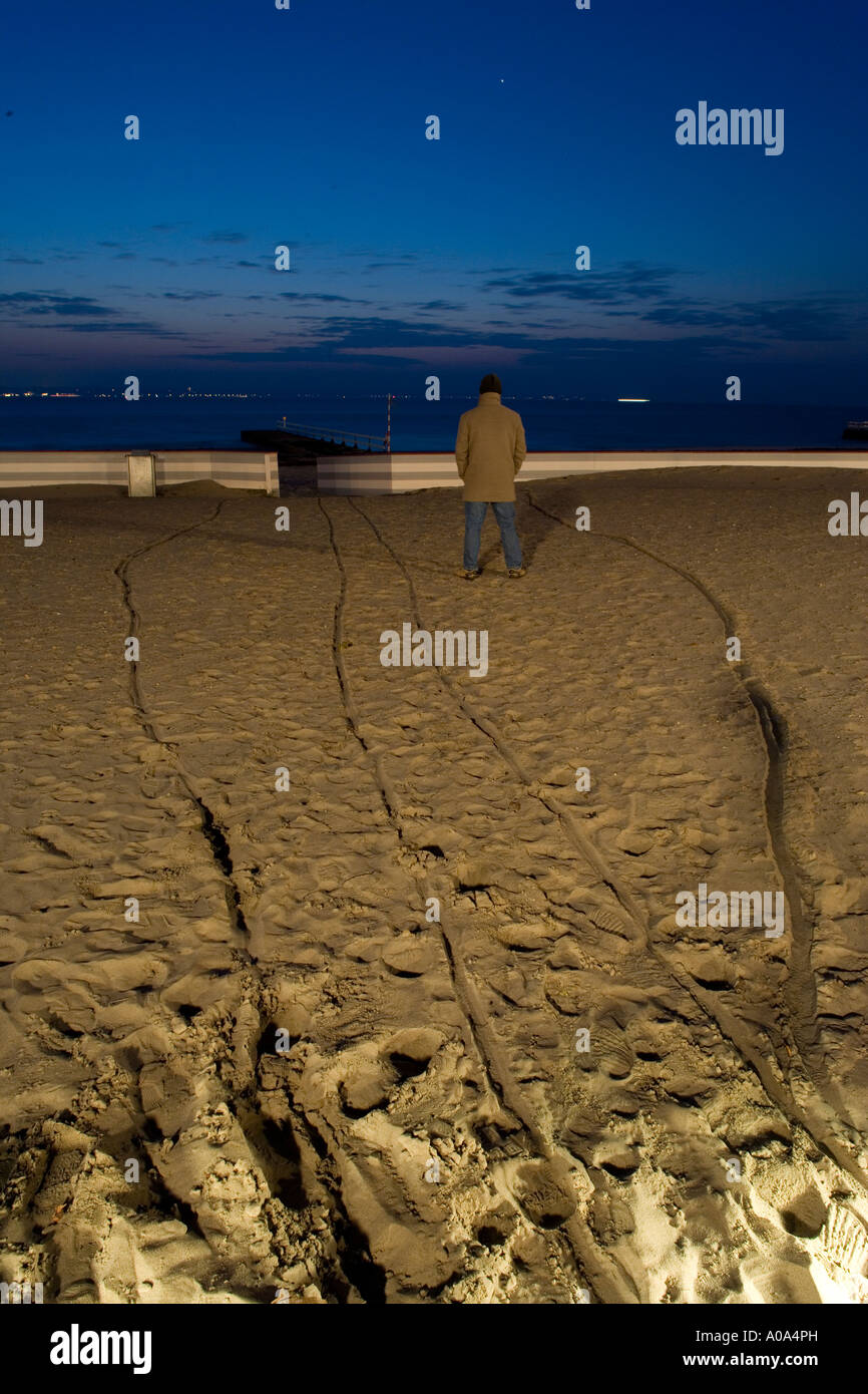 man on nightbeach Stock Photo - Alamy