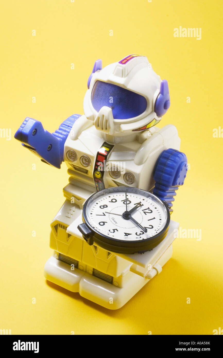Robot with Clock Stock Photo - Alamy