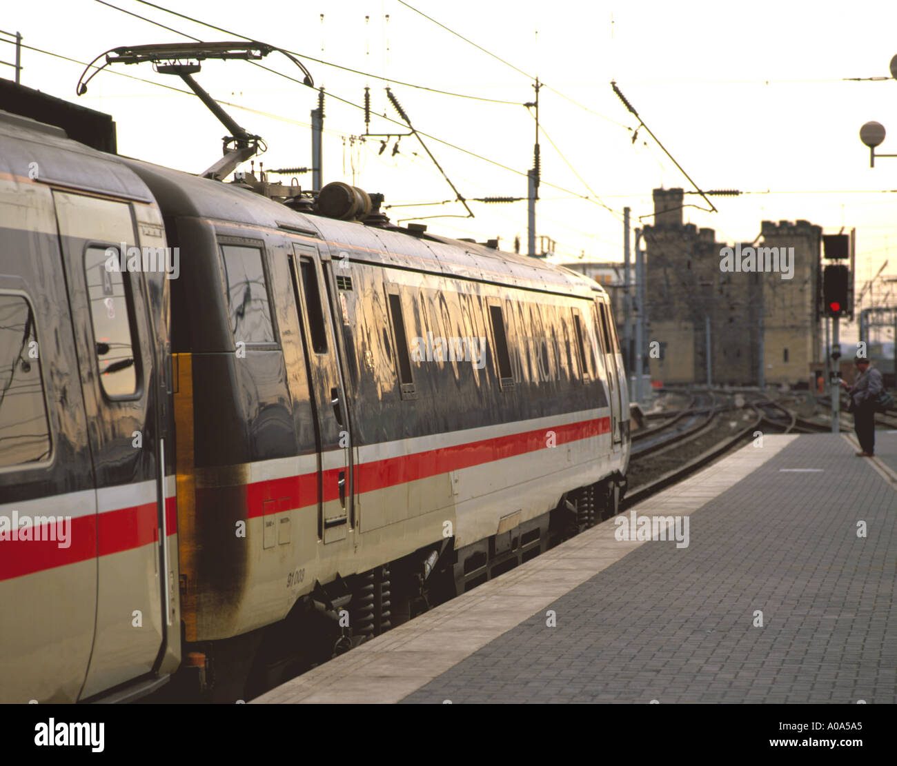 Intercity 225 train at Central Station, with the Castle Keep beyond ...