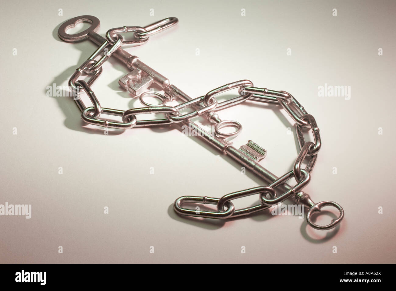 Skeleton Keys on Chain Forming Dollar Sign Stock Photo - Alamy