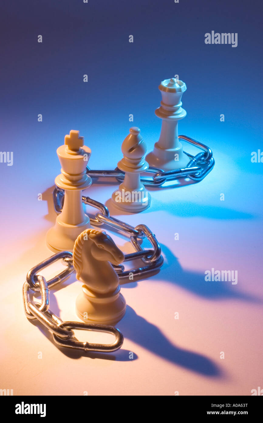 Chain and Chess Pieces Stock Photo - Alamy
