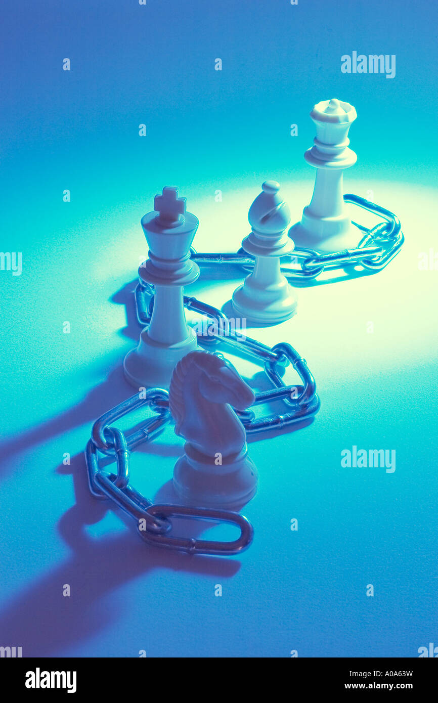 Chess Pieces with Chain Stock Photo - Alamy