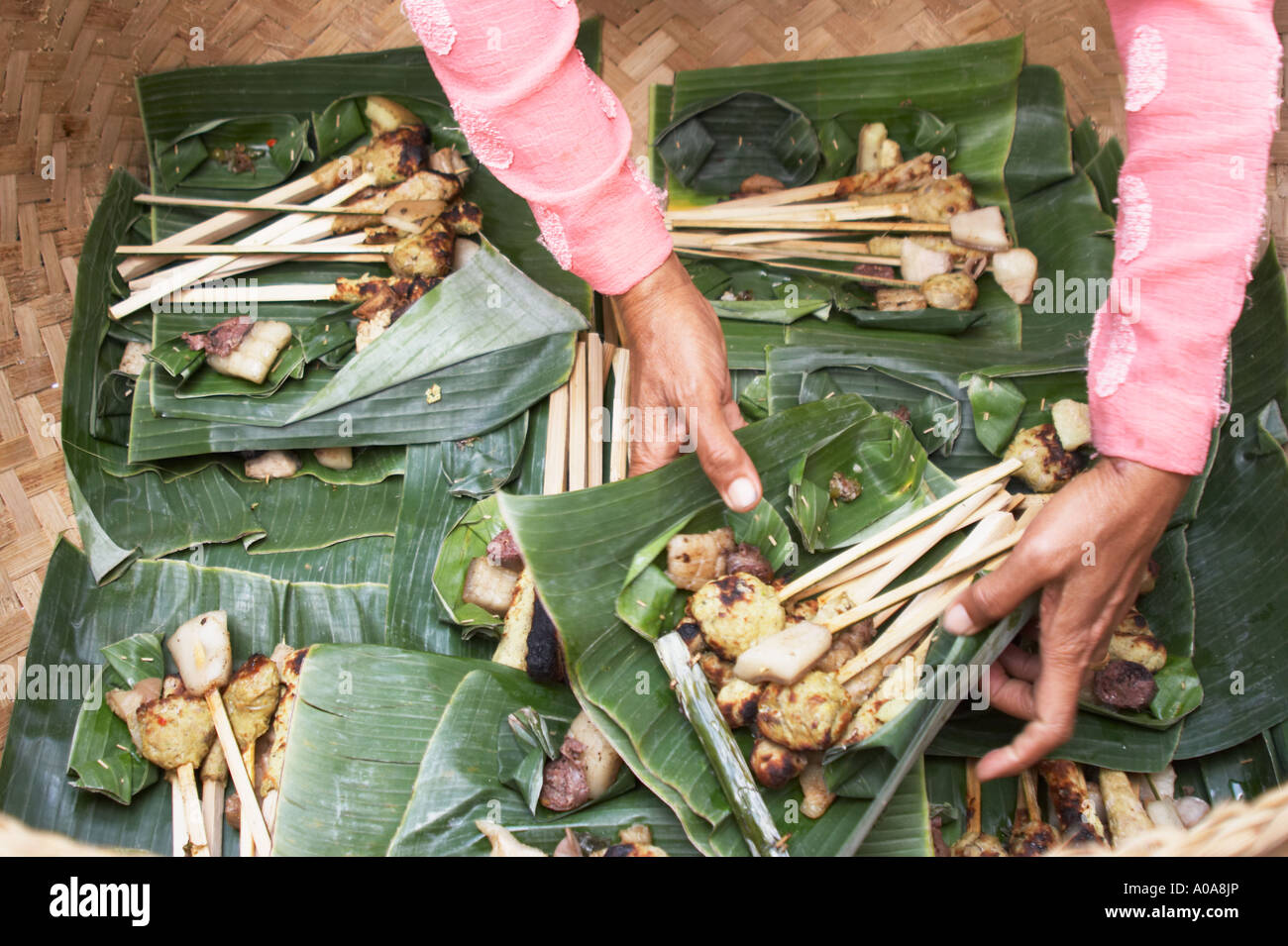 Placing ceremonial offerings hi-res stock photography and images - Alamy
