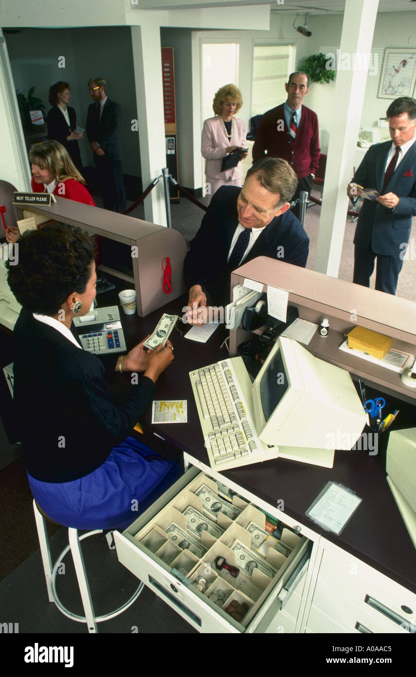 Bank teller and customer line hi-res stock photography and images - Alamy