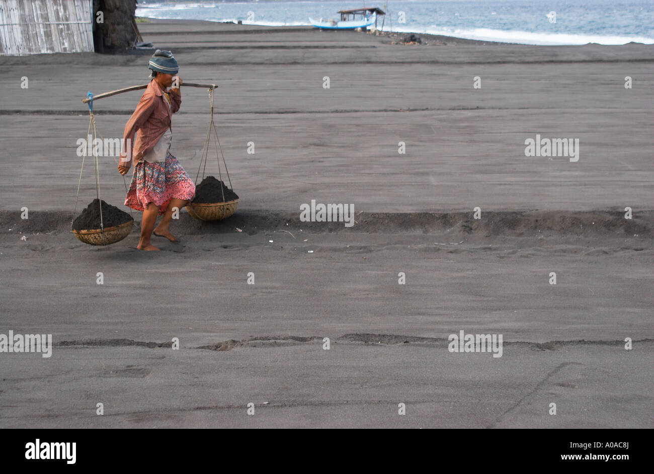 Salt Maker Carrying Sand Stock Photo - Alamy