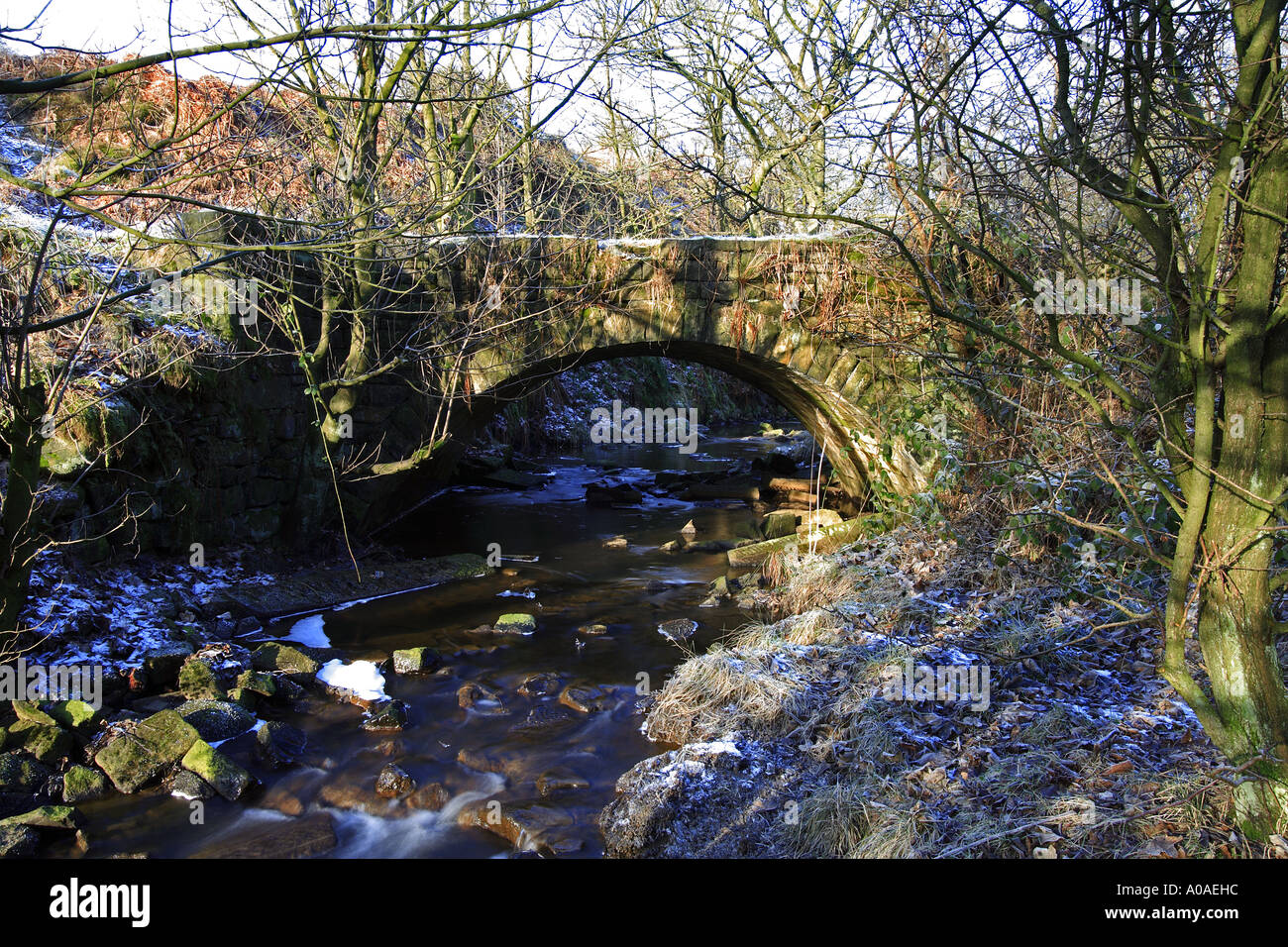 The packhorse bridge across the Cheesden Brook in the Cheesden Valley ...
