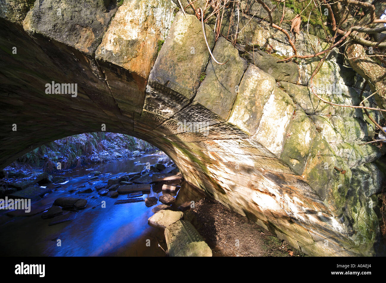 The Pack horse bridge near Washwheel Mill over the Cheesden Brook ...