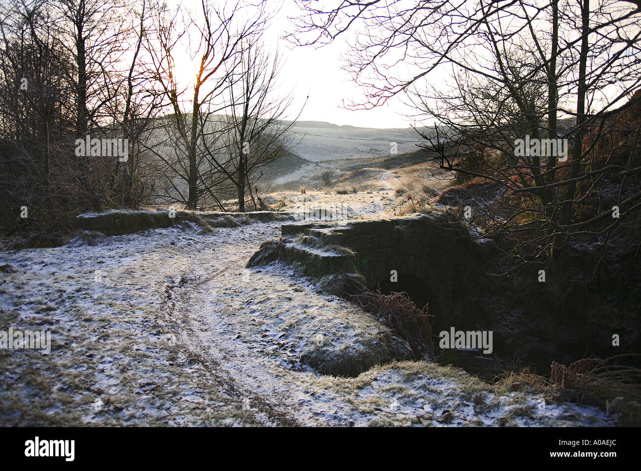 Winter scene at the Pack horse bridge near Washwheel Mill over the ...