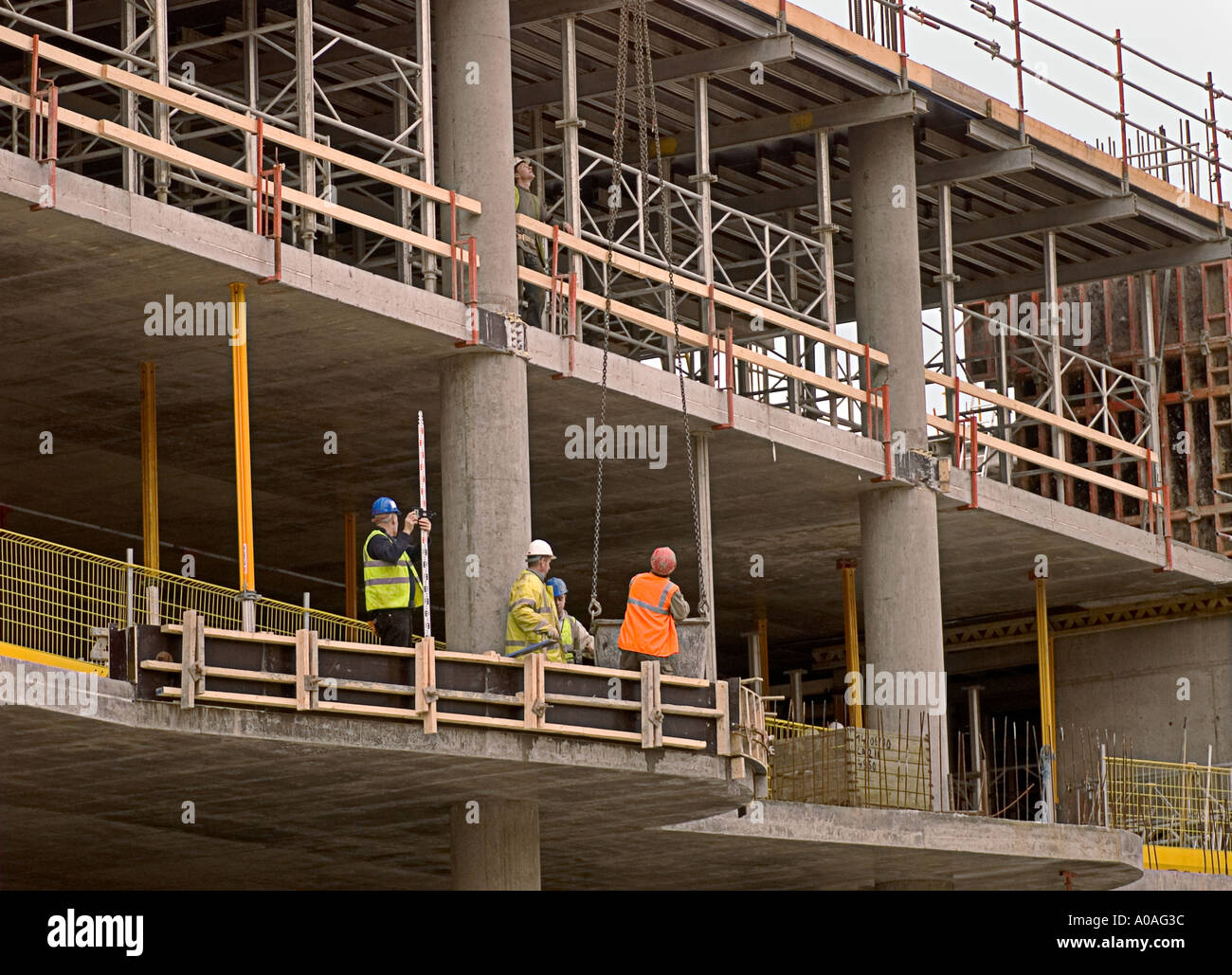 builders in a construction site Stock Photo - Alamy