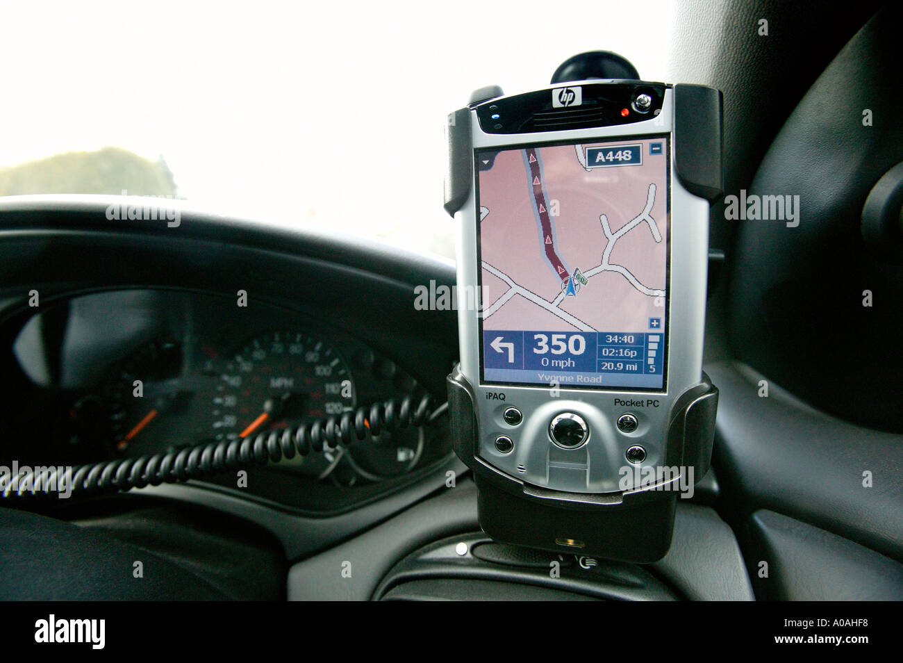 A Pocket PC GPS system mounted in a car Stock Photo - Alamy
