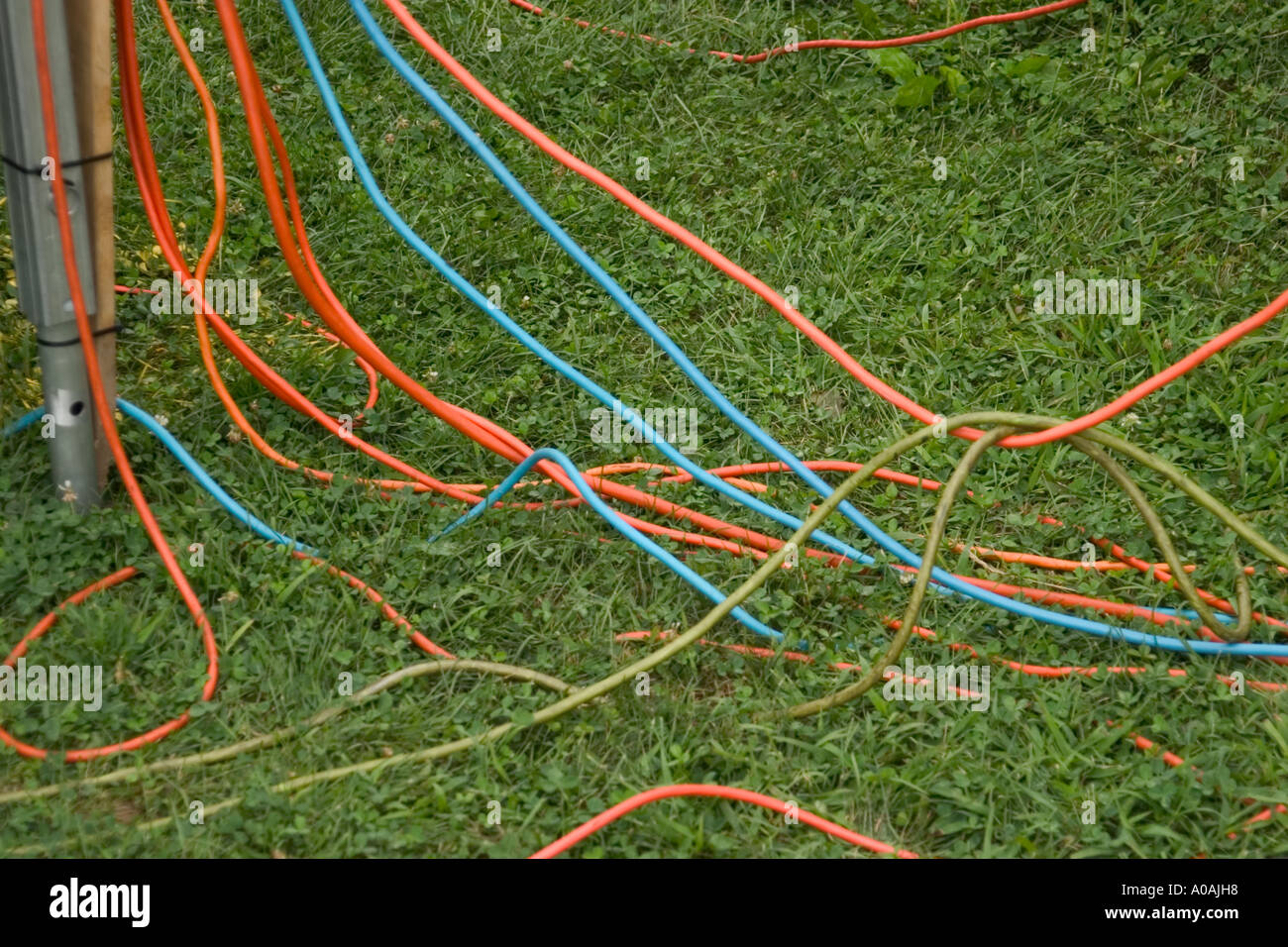 Colored wire layed out on a section of grass Stock Photo - Alamy