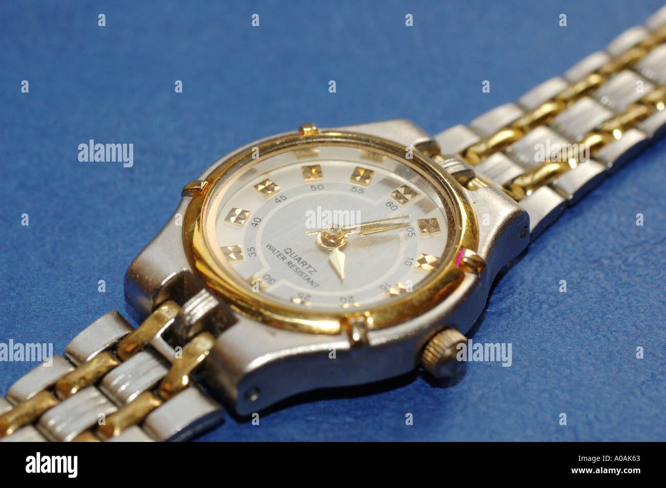 womens watch made from with yellow and white metal without any logo and ...