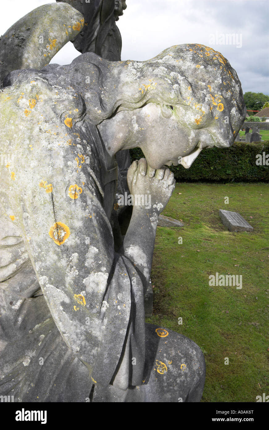 Statue effigy praying angel two angels Stock Photo - Alamy