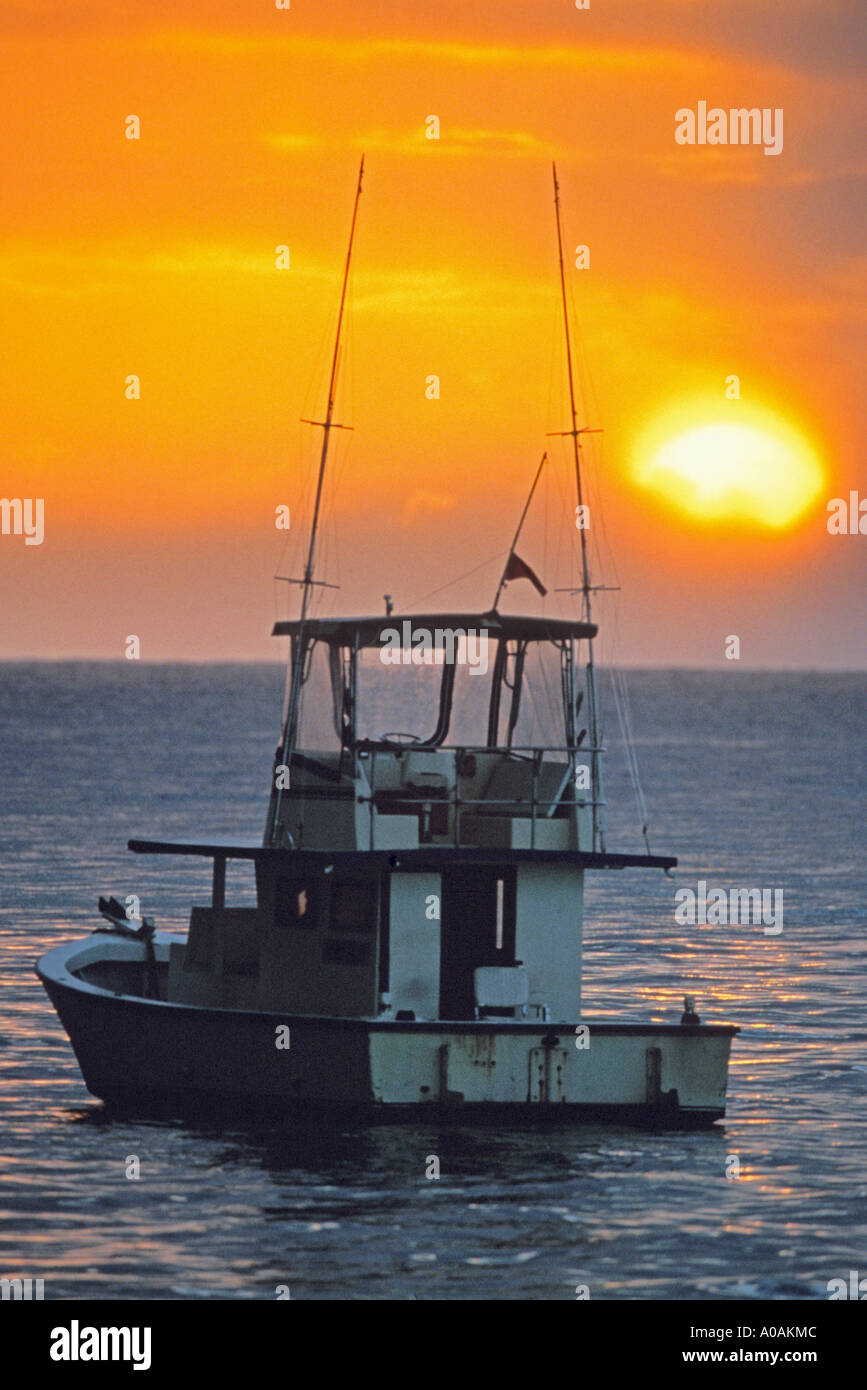 CARIBBEAN TRINIDAD Fishing boat at sunset Pigeon Point Stock Photo - Alamy