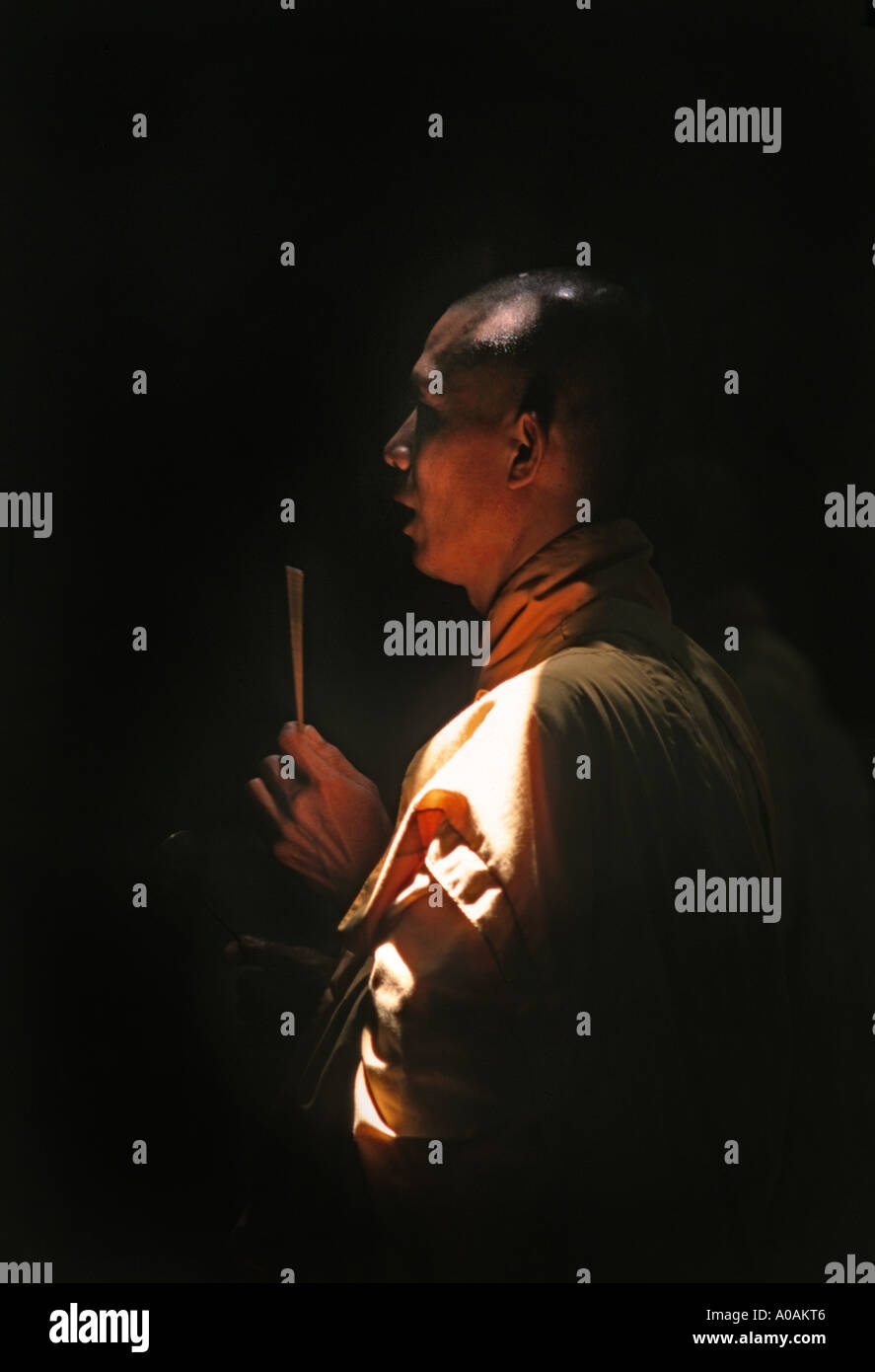 Standing in prayer hi-res stock photography and images - Alamy