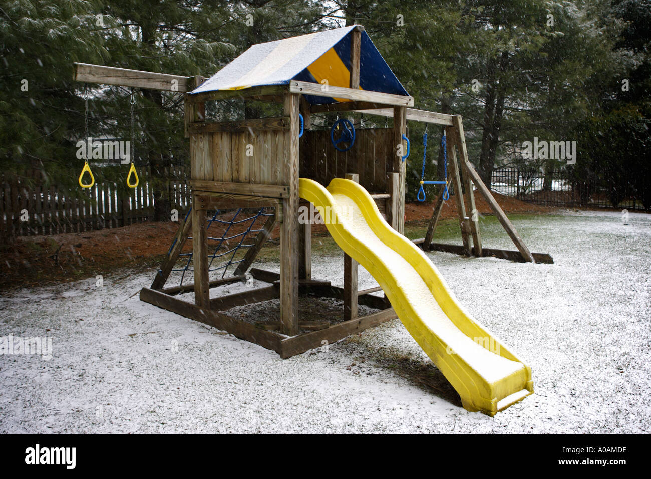 Backyard playground during the winter Stock Photo - Alamy