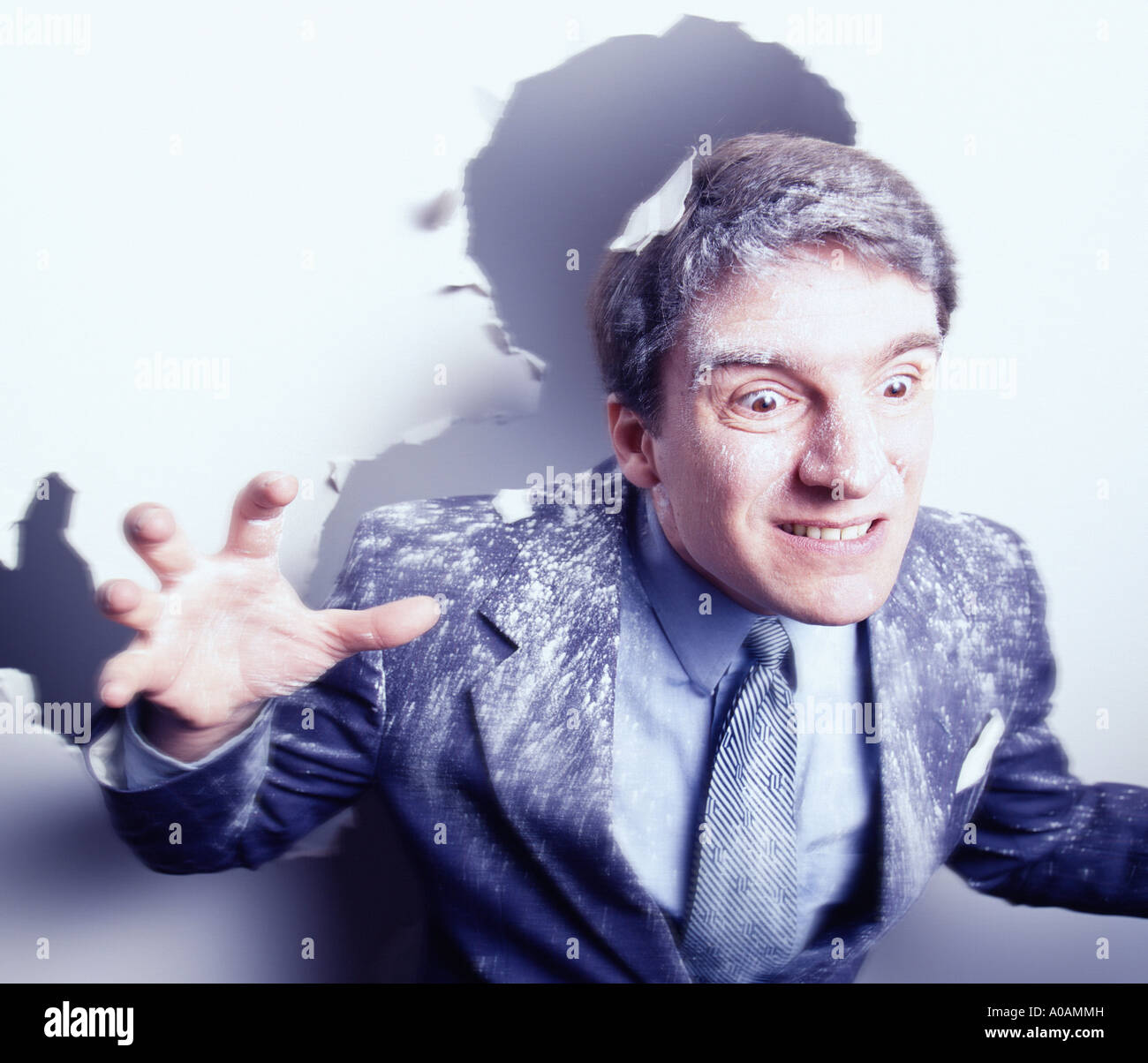 Businessman breaking through wall hi-res stock photography and images ...