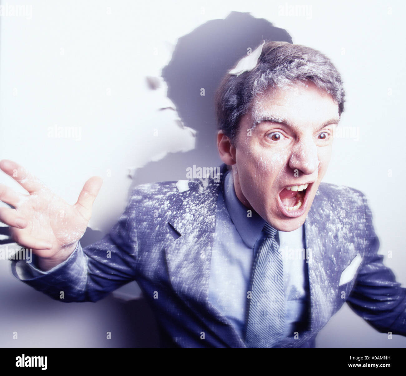 Businessman breaking through wall hi-res stock photography and images ...