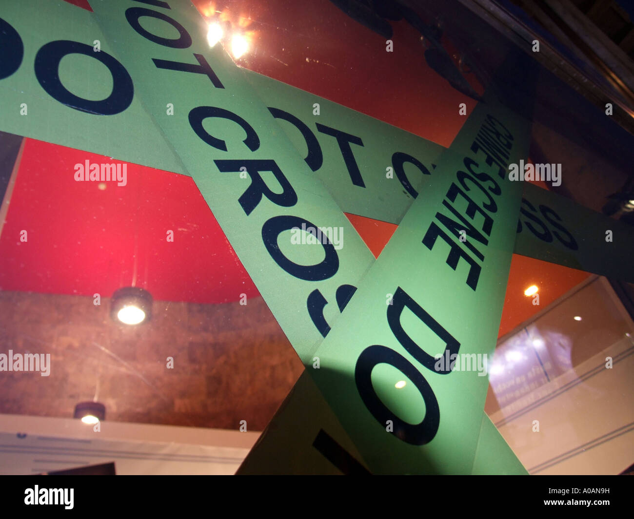 crime scene tape on shop window Stock Photo - Alamy