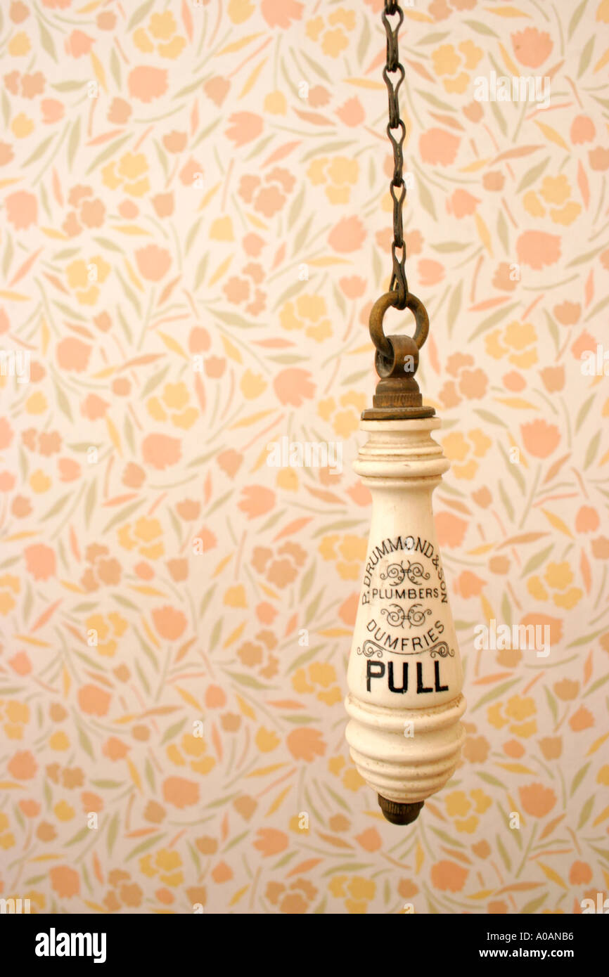 Handle and chain of old toilet cistern Stock Photo - Alamy