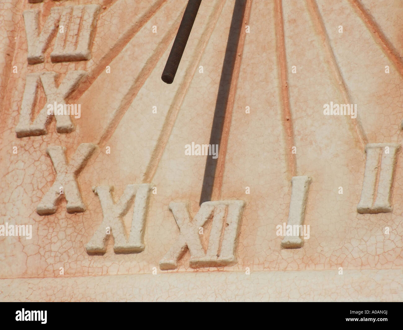 12 o'clock on sun dial Stock Photo - Alamy