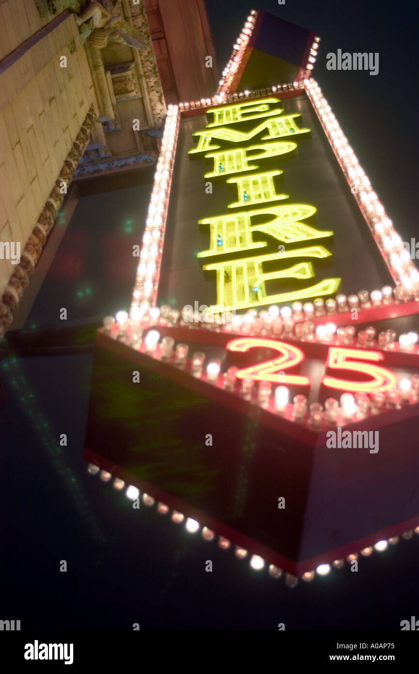 A color vertical image of lighted rotating sign for the Empire theater ...