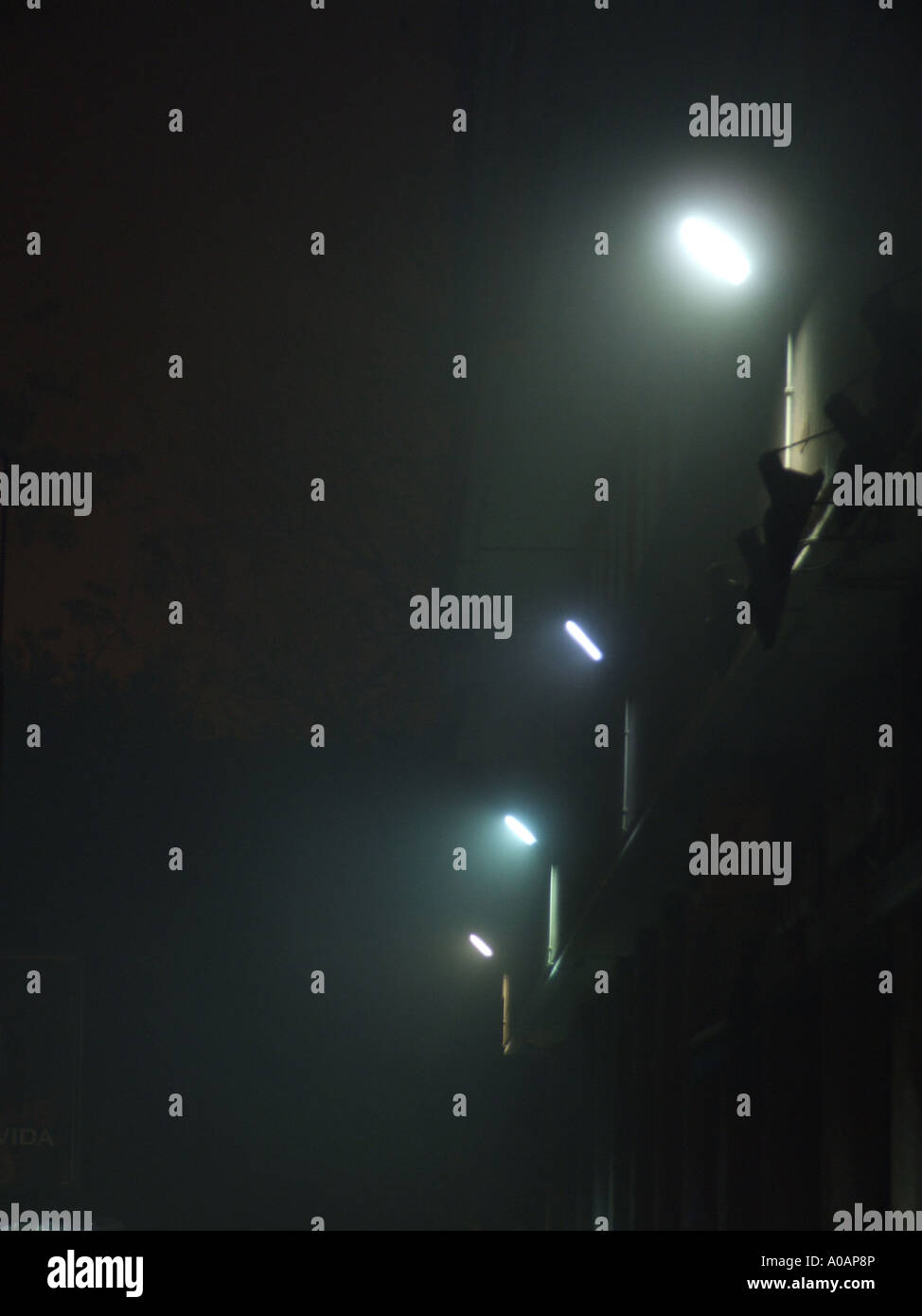 Row street lights fog hi-res stock photography and images - Alamy