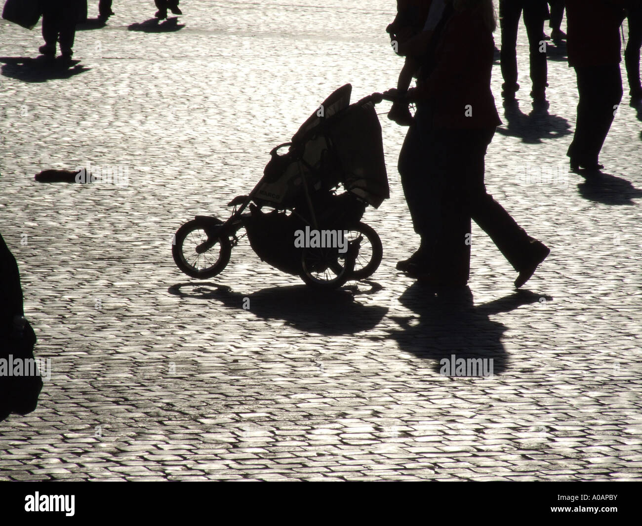 Shadow pushing pram hi-res stock photography and images - Alamy
