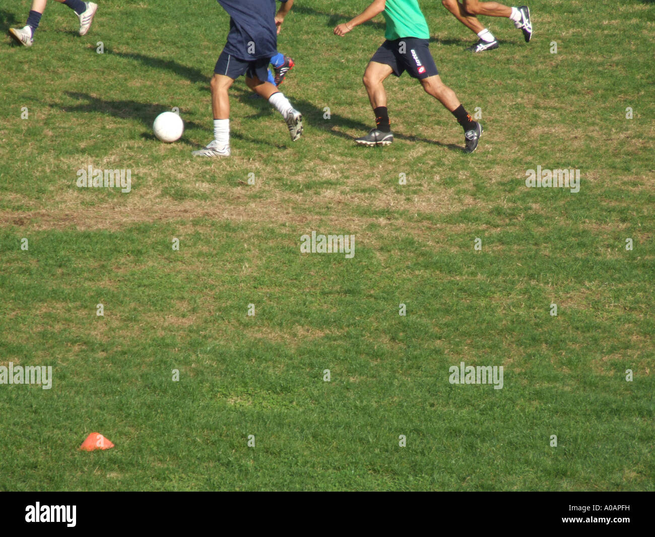 Footballer legs tackle hi-res stock photography and images - Alamy