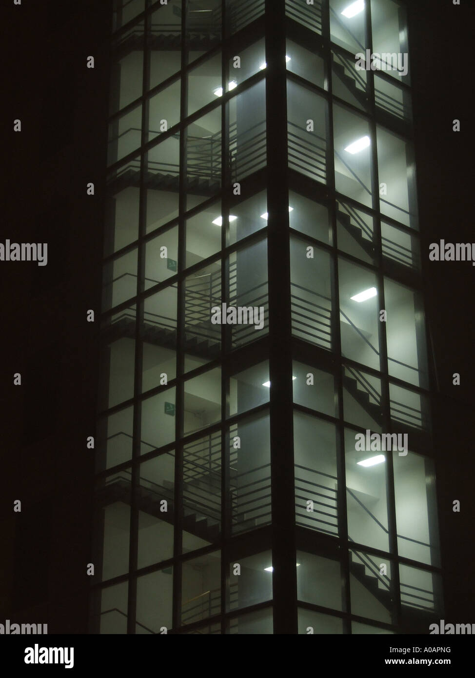 high rise building in fog at night Stock Photo - Alamy