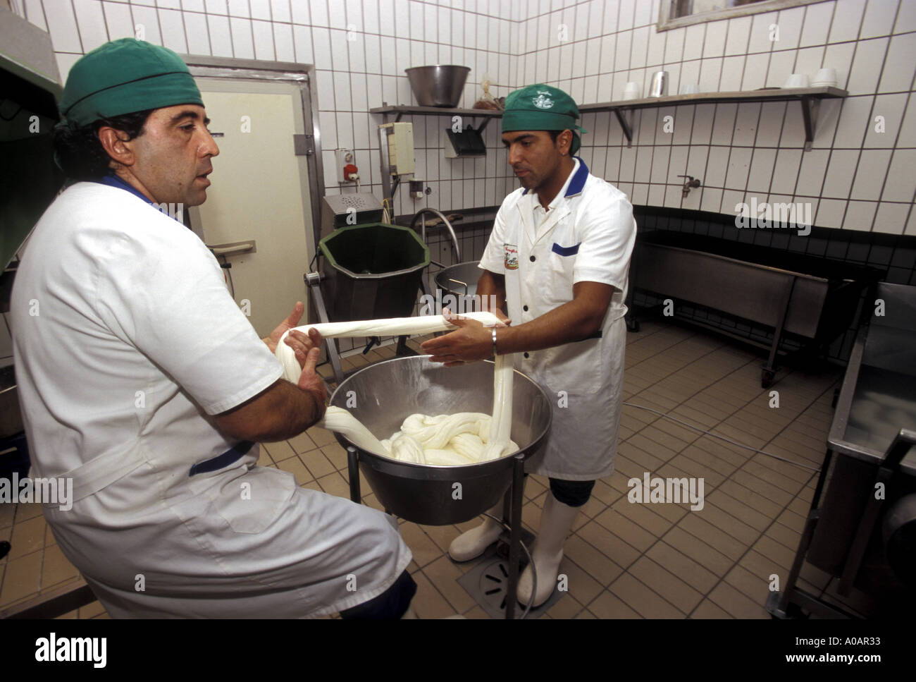 Preparation of Provolone del Monaco cheese Russo dairy Vico Equense ...