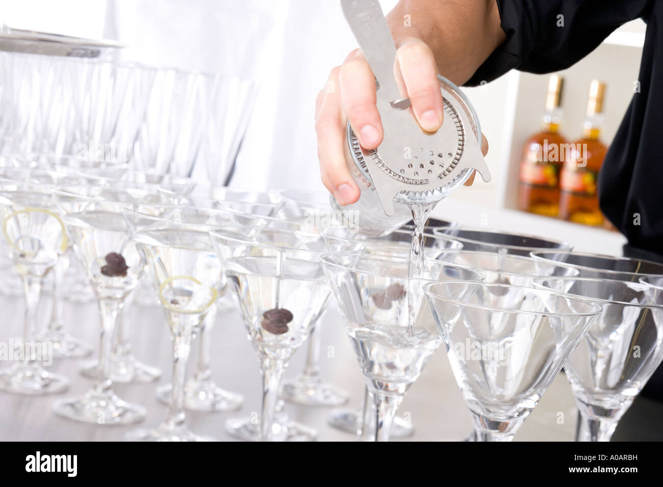 Martini being poured hi-res stock photography and images - Alamy
