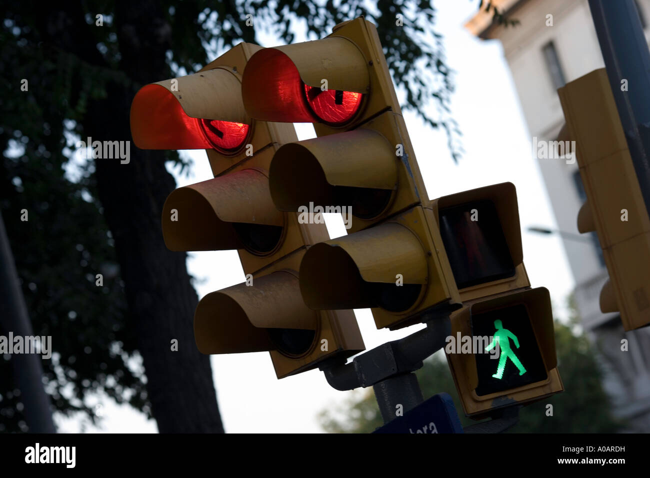 Red traffic lights with green pedestrian sign illuminated Stock Photo ...