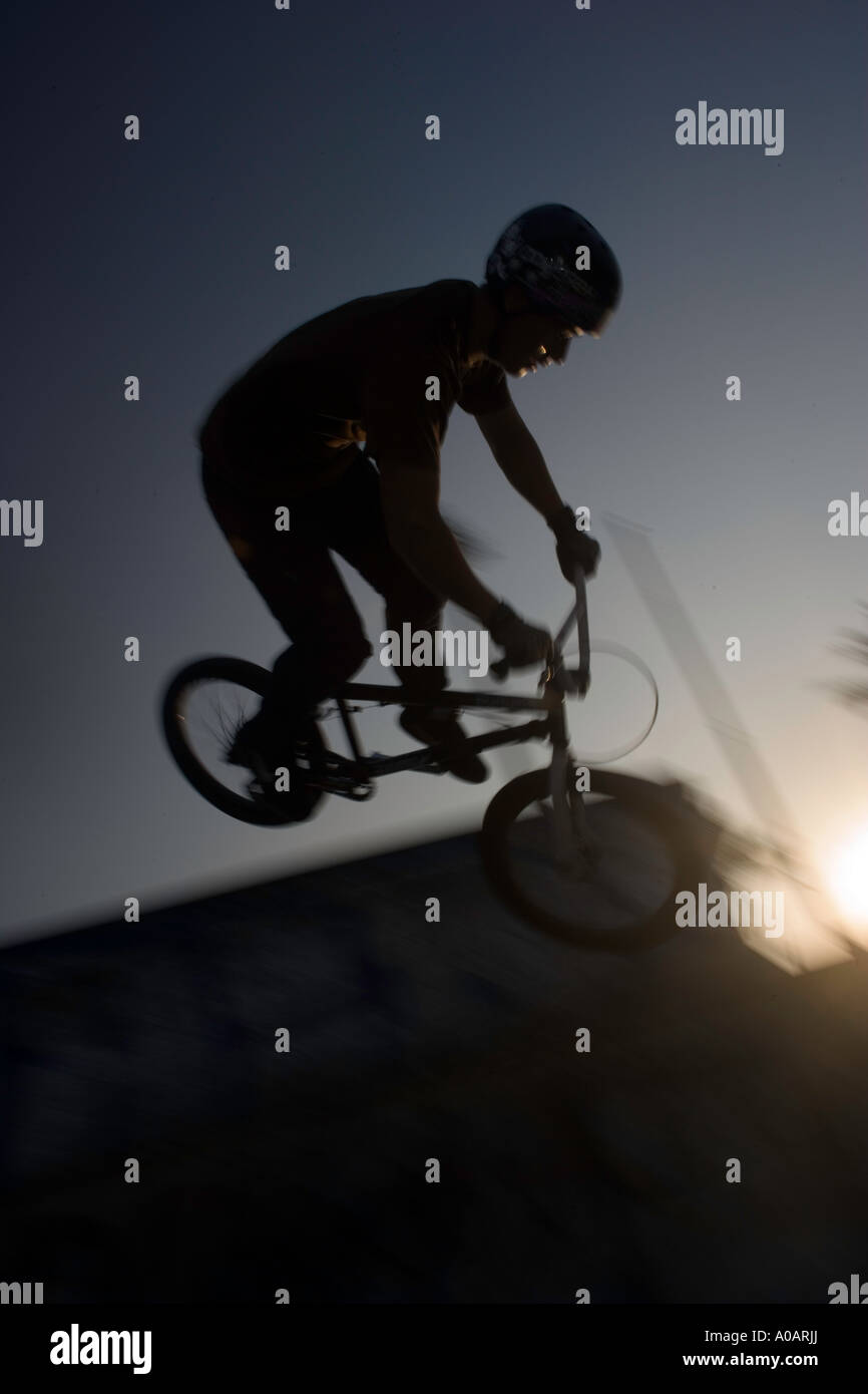 BMX stunt rider in mid air Stock Photo - Alamy