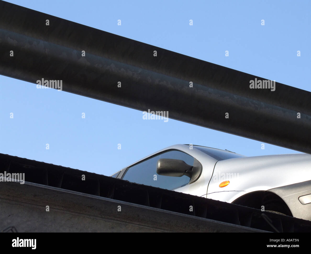 car and crash barrier in car park Stock Photo - Alamy