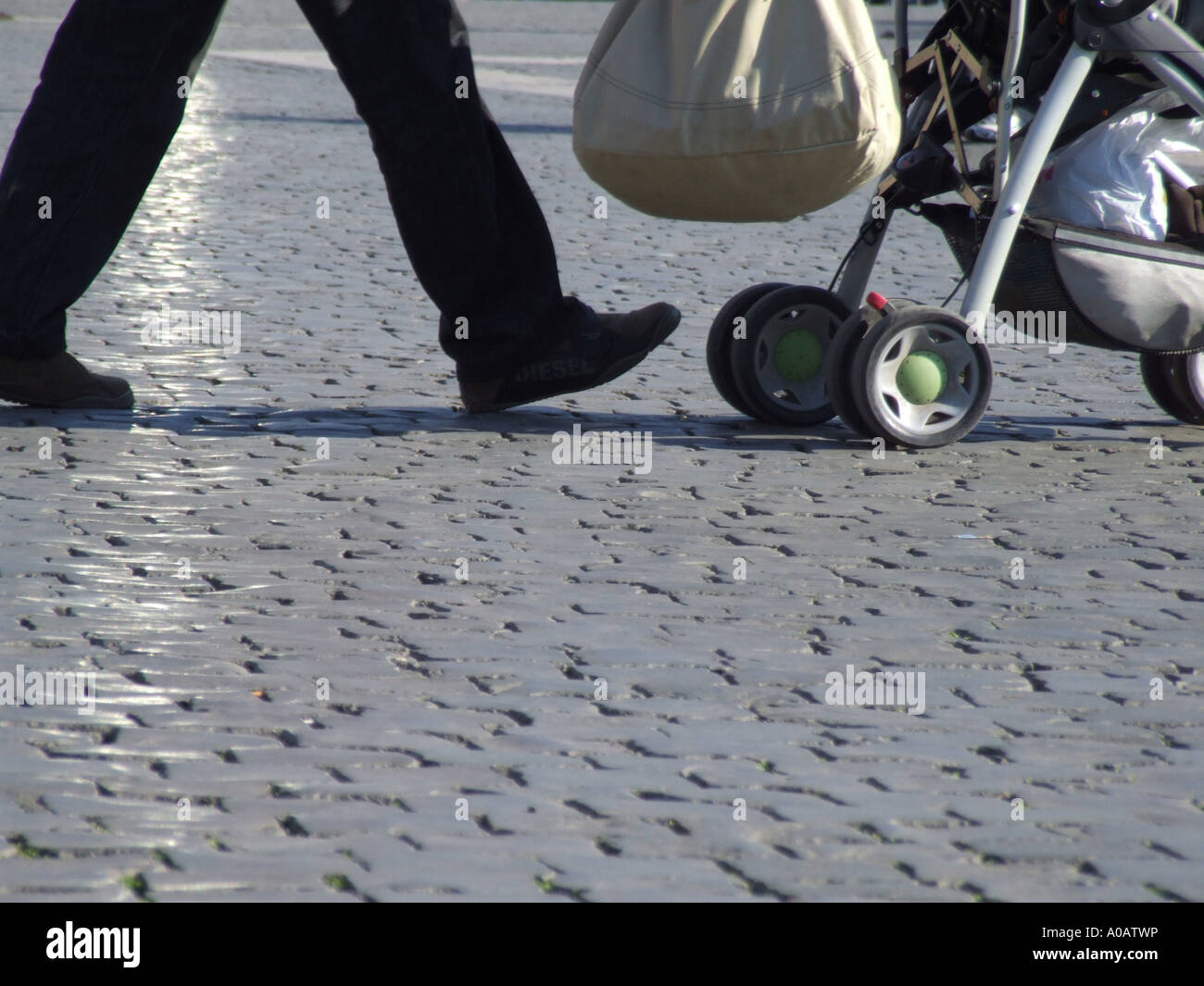 Shadow pushing pram hi-res stock photography and images - Alamy